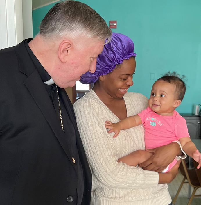 A Visit With Archbishop Mitchell Rozanski – Our Lady's Inn